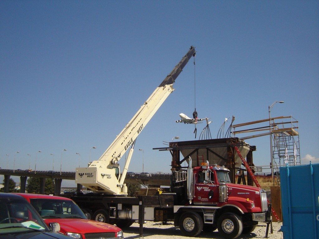 40 t crane at work in Richmond w plane overhead - All Things Cranes